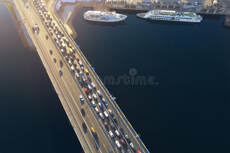 Aerial View of Road Bridge Across River with Heavy Traffic Jam in One ...
