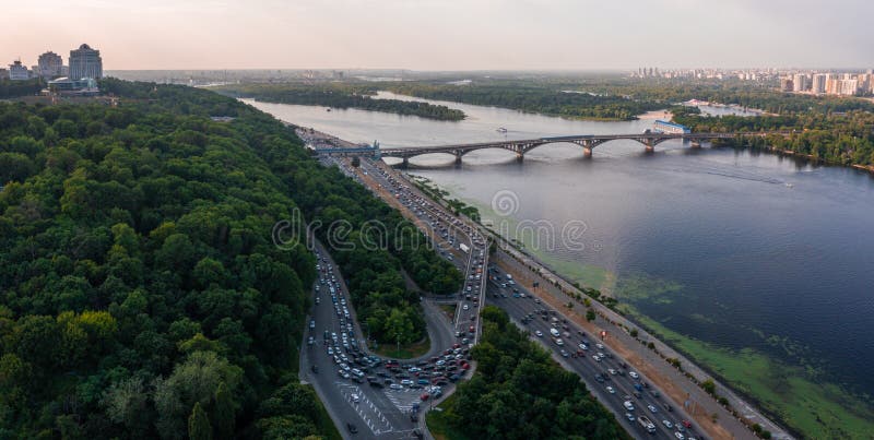 Aerial View of Road Bridge Across River with Heavy Traffic Jam in One ...