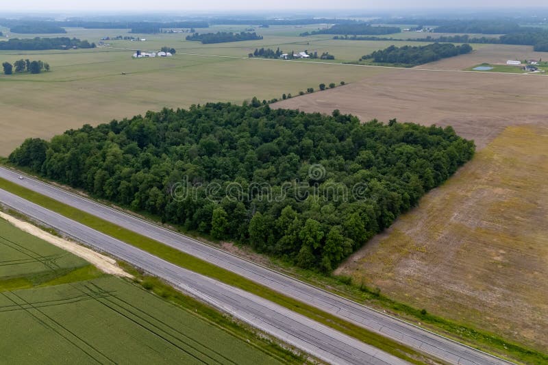 Aerial View of Road Cutting through Fields. Stock Photo - Image of road ...