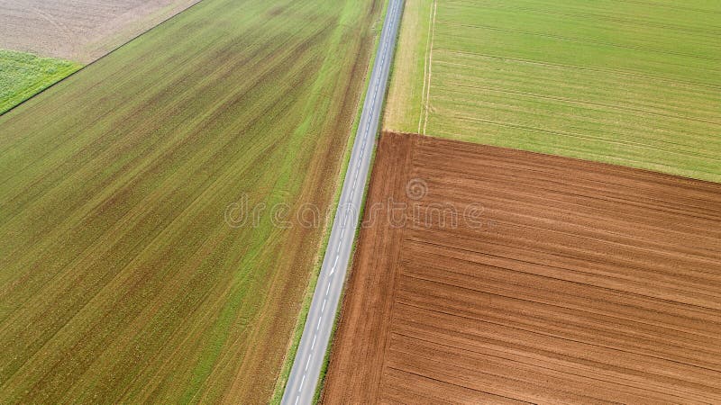 Aerial View of a Road in the Middle of the Fields Stock Image - Image ...