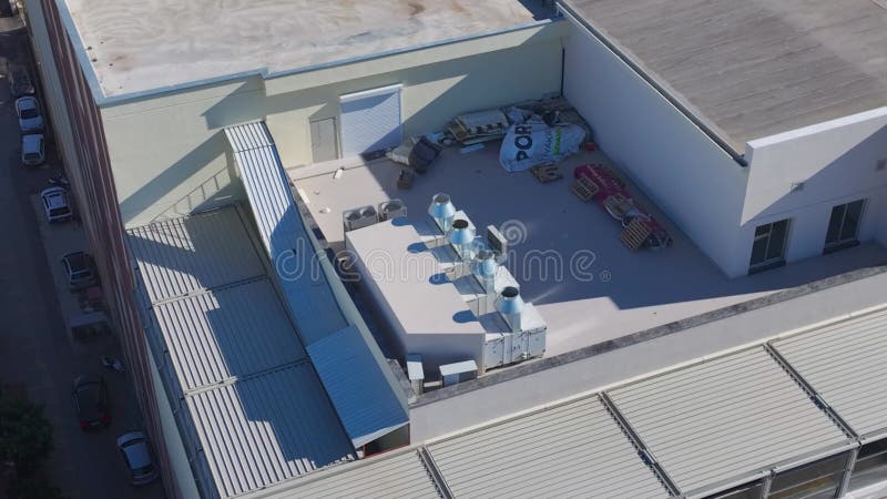 Aerial View: the Rooftop of a Large Retail Complex Featuring Air ...