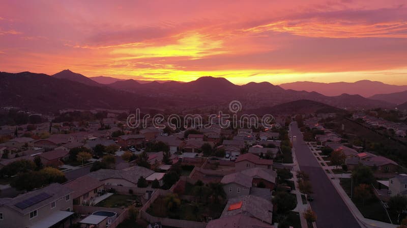 Aerial View of Rooftops on the Background of Mountains in the Distance ...