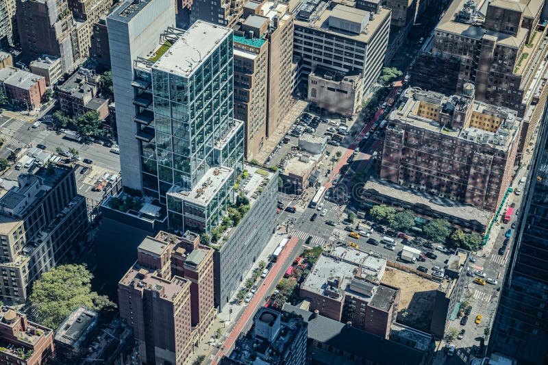 An Aerial View of the Rooftops of Buildings and Bustling Streets of New ...