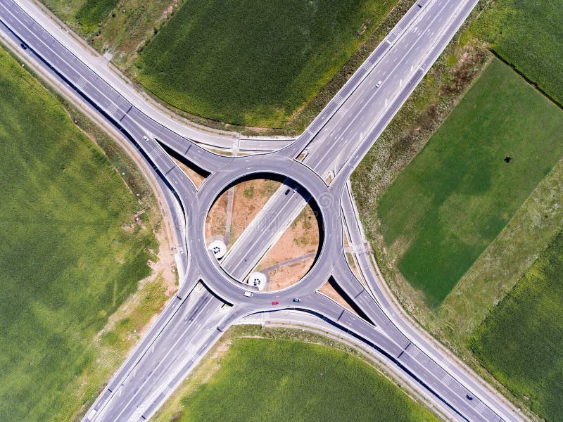 View of a Roundabout Traffic Circle and Island with Palm Trees in ...