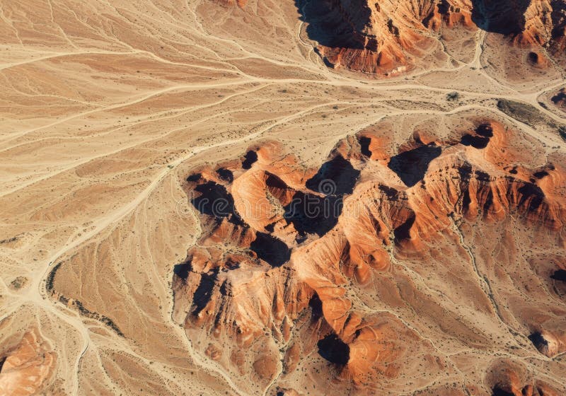 Aerial View of Rugged Desert Landscape Showing Unique Erosion Patterns ...