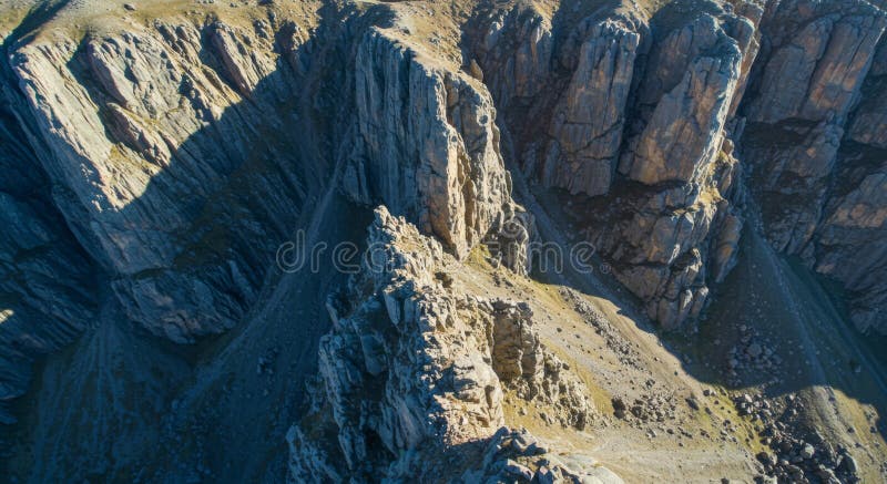 Aerial View of Rugged Mountain Range with Deep Shadows Stock ...