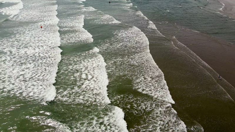 This is an Aerial View of a Sandy Beach. the Waves are Breaking on the ...