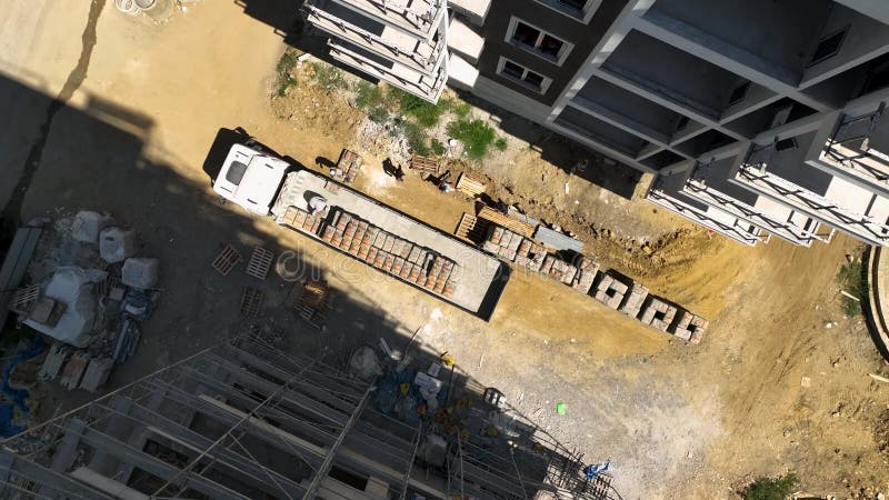 Aerial View: Scaffolding Climbs the Sides of a Residential Building ...