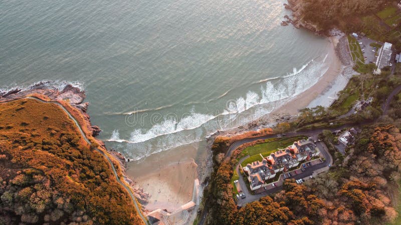 Aerial View of Sea Waves and a Beautiful Resort on a Cliff Stock Image ...