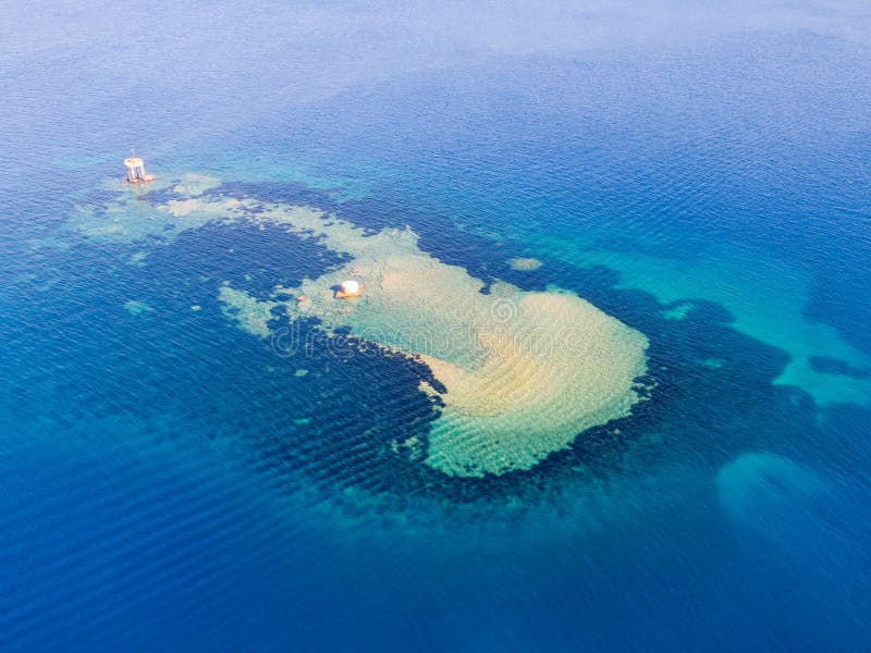 Aerial View of a Shallow Reef and Deep Blue Ocean Stock Photo - Image ...