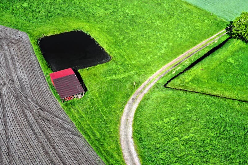 Aerial View of a Shed Behind a Small Artificial Fish Pond on a Path ...