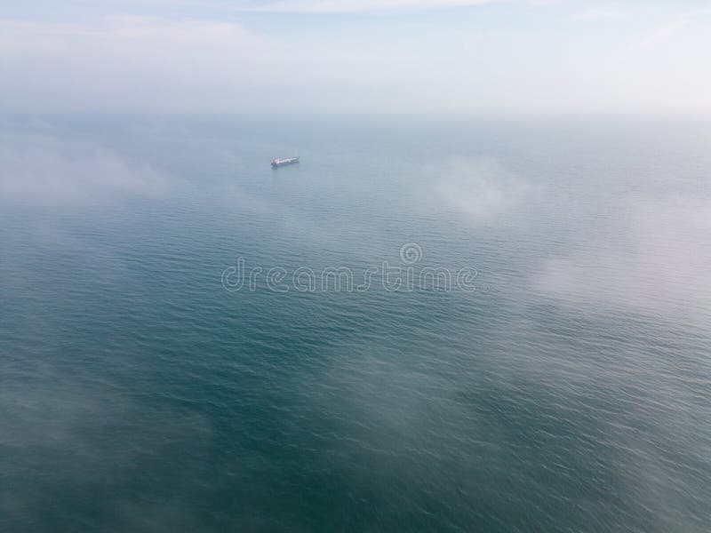 Aerial View of Ships Navigating through Foggy Conditions. Stock Photo ... Aerial View of Ships Navigating through Foggy Conditions. Stock Photo ...