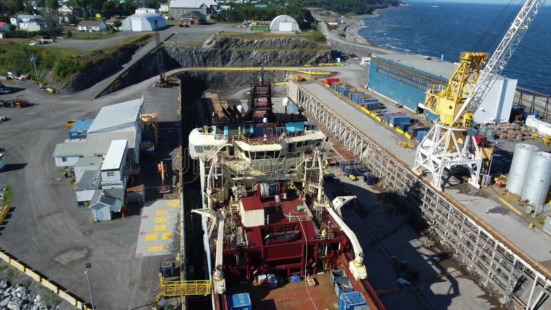 Aerial View of a Shipyard with a Boat in Dry Dock for Maintenance ...