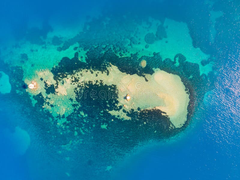 Aerial View of a Small, Secluded Island in Azure Waters Stock Photo ...