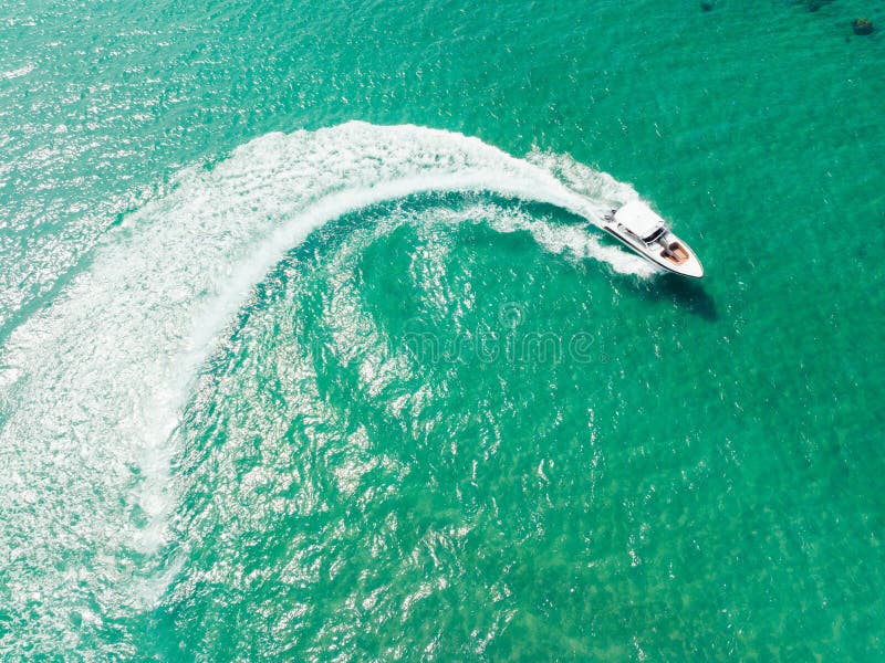 Aerial View of Speed Boat at High Speed in the Aqua Sea, Drone View ...