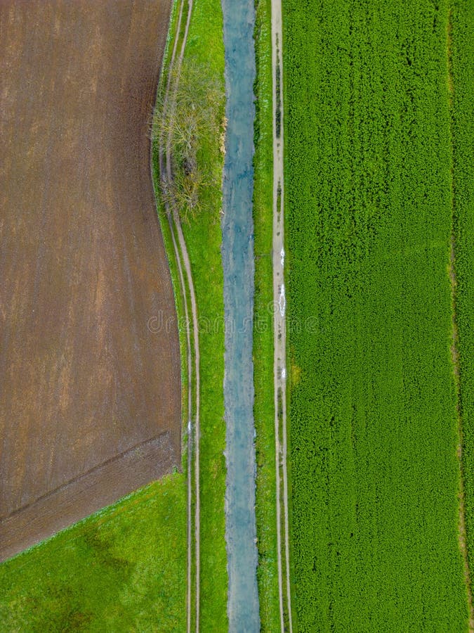 Aerial View of Stream Running between Fields Stock Image - Image of ...