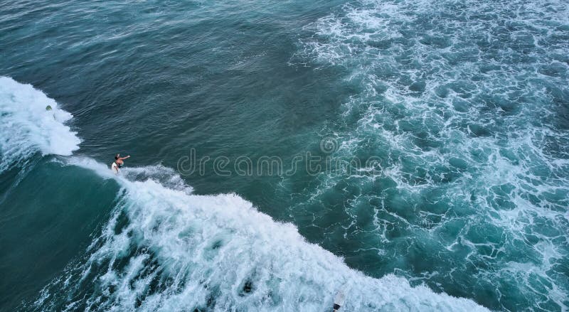 Aerial View of a Surfer Riding on the Waves in the Ocean Editorial ...