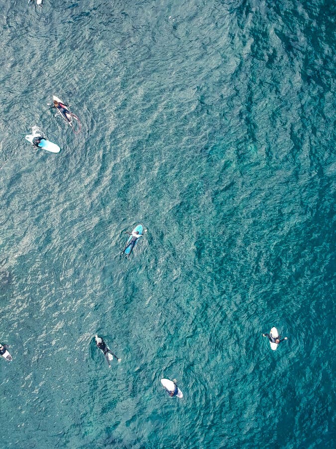 Aerial View of Surfers in the Azure Waters of the Atlantic Ocean. Top ...