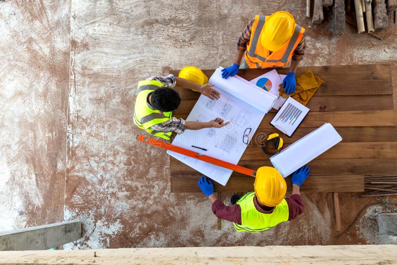 Aerial View Team of Engineer and Architects Working in Construction ...