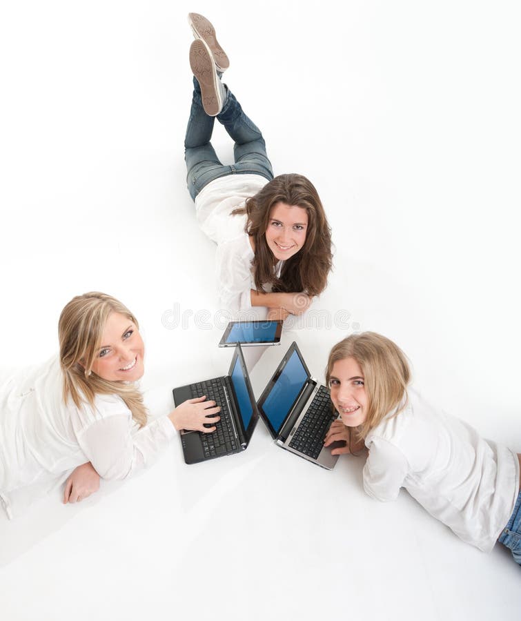 Aerial View of Three Smiling Girls with Computer Stock Image - Image of ...