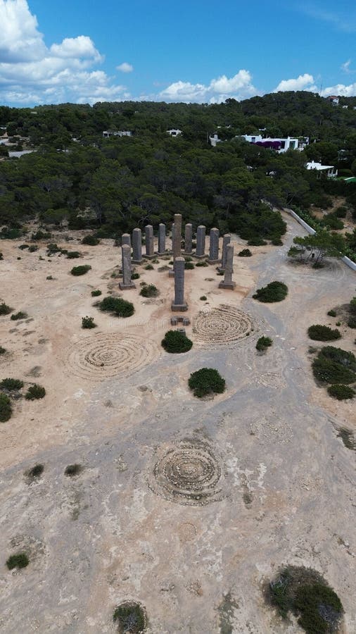Aerial View of Time and Space Rock Columns Sculpture on the Sandy Beach ...