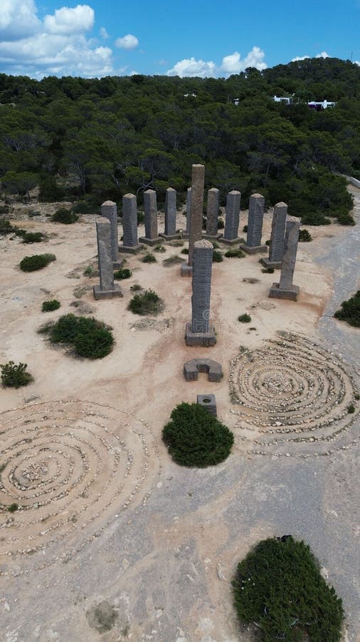 Aerial View of Time and Space Rock Columns Sculpture on the Sandy Beach ...