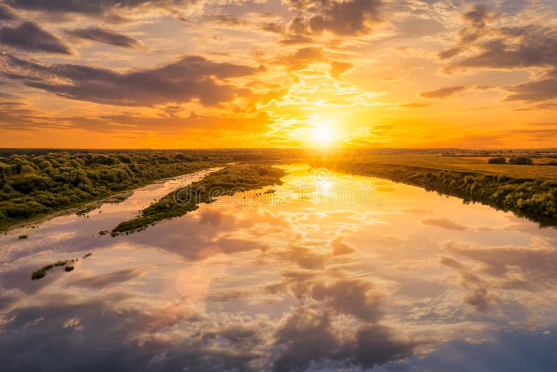 Aerial View To Sunset on the River at Summer Evening with Clouds and ...