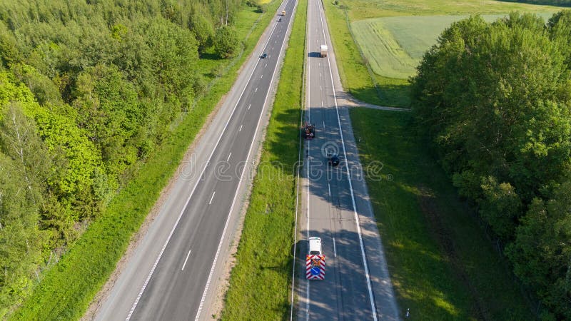 Aerial View of Tractor Mowing Grass Along Roadside Stock Photo - Image of area, roadside: 351822320