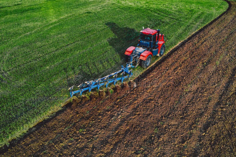 Aerial View of Tractor Plowing Field Stock Image - Image of harvester ...