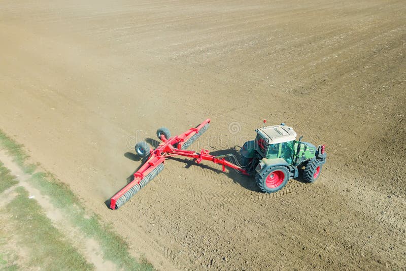 Rolling Tractor Flattening Land To Be Developed Stock Photo - Image of ...
