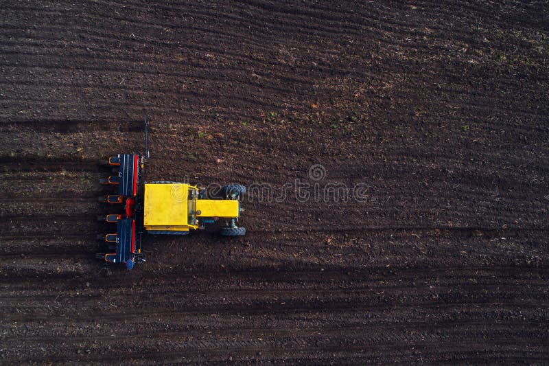 Aerial View of Tractor Working on the Harvest Field Stock Photo - Image ...