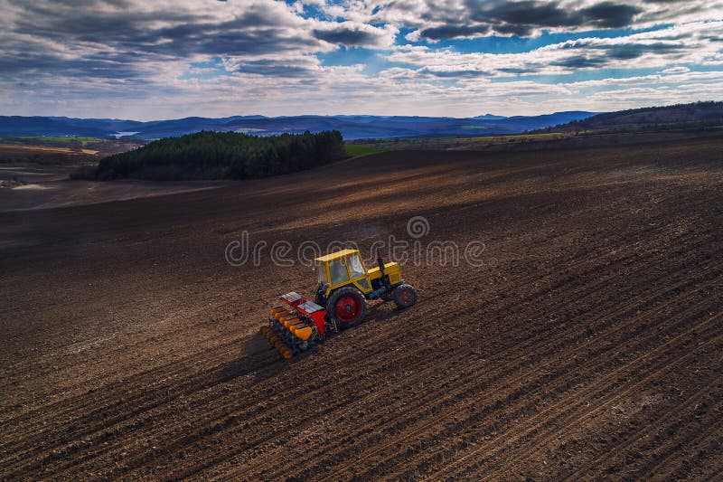 Aerial View of Tractor Working on the Harvest Field Stock Image - Image ...