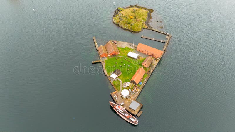 Aerial View of Triangular Island with Red-Roofed Buildings Stock Photo ...