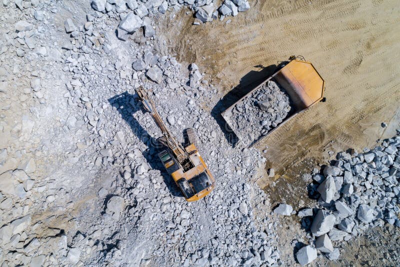 Truck and Bulldozer Working in the Stone Mine Stock Image - Image of ...