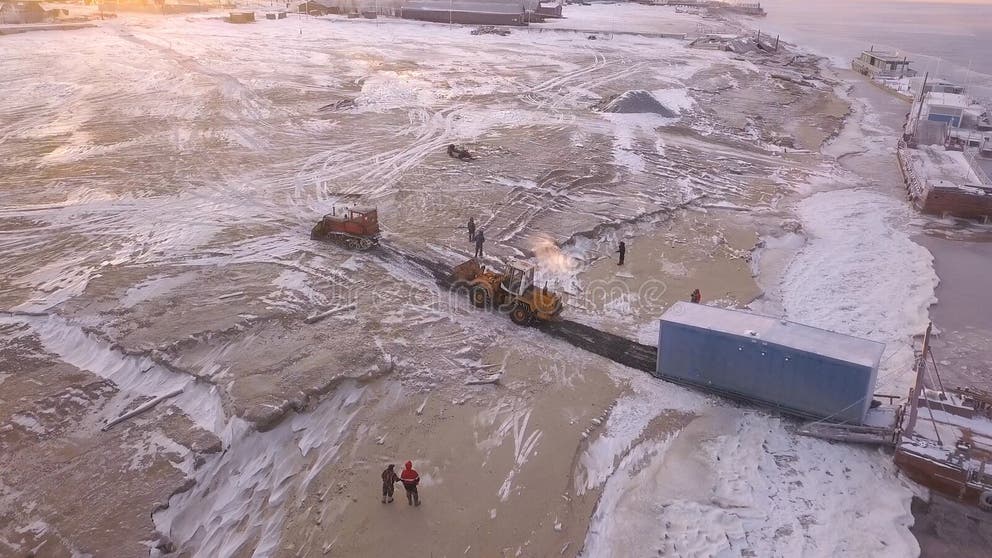 Aerial View of the Unloading Barge Process. Clip. Transporting Large ...