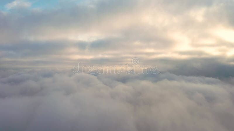 Aerial View Up from the Clouds To the Sky in Motion. Aerial View White ...