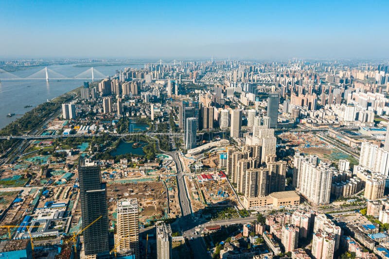 Aerial View of a Vibrant City Skyline, with a Bridge Connecting Two ...