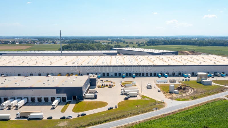 Aerial View of a Warehouse of Goods. Logistic Warehouse Buildings and ...
