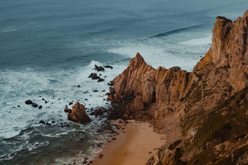Aerial View of Waves Reaching the Cliffs of Cabo Da Roca on a Sunny Day ...