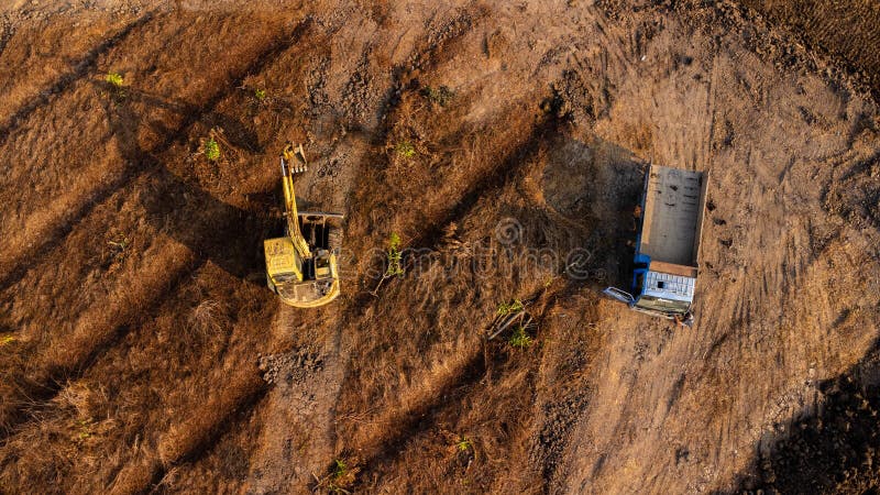 Aerial View of a Wheel Loader Excavator with a Backhoe Loading Sand ...