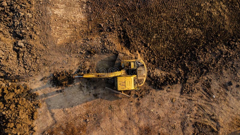 Aerial View of Wheel Loader Excavator with Backhoe Unloading Sand in ...