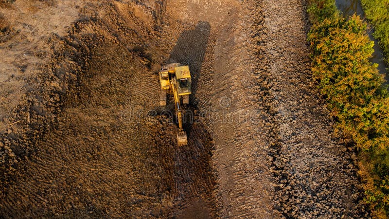 Aerial View of Wheel Loader Excavator with Backhoe Unloading Sand in ...