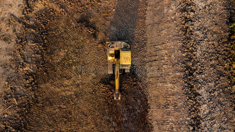 Aerial View of Wheel Loader Excavator with Backhoe Unloading Sand in ...