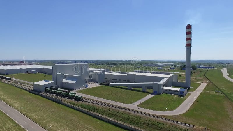 An Aerial View of a White Factory Building in Green Fields Stock ...