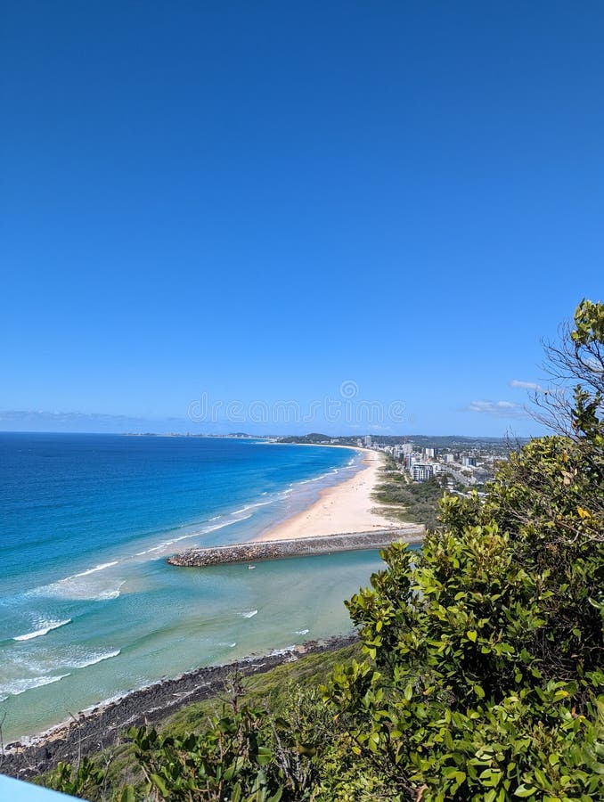 Aerial View of a White Sand Beach and a Deep Blue Ocean from the Top of ...