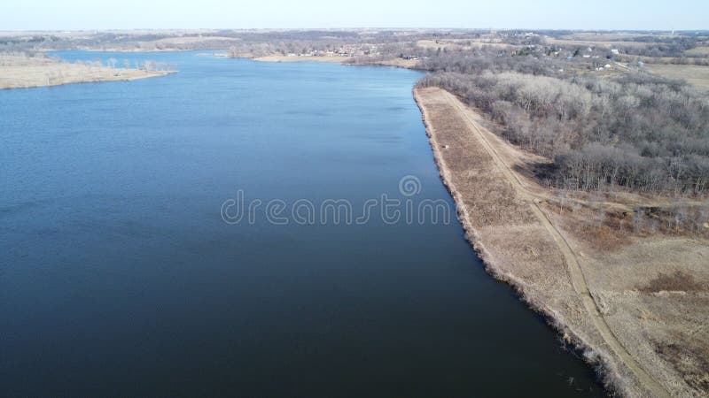Aerial View of a Winding Blue River through a Dry Yellow Landscape ...
