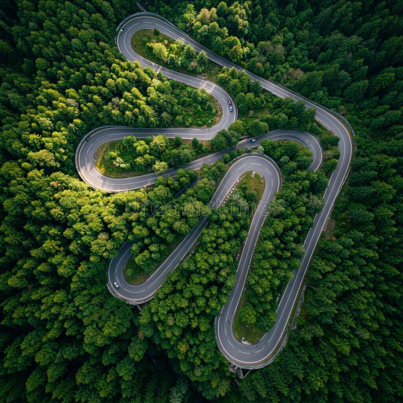 Aerial View of a Winding Road with Multiple Sharp Curves, Cutting ...