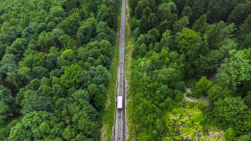 An Aerial View of the Road and Train Tracks in the Woods Stock Image ...
