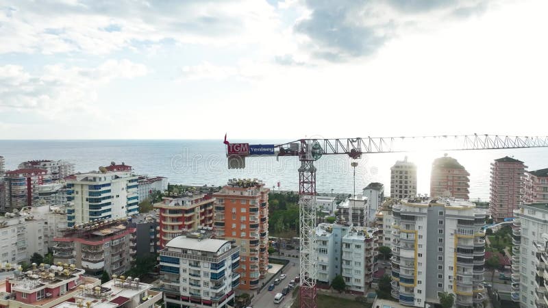 Aerial View: Workers Pour Concrete on a Large Construction Site while ...