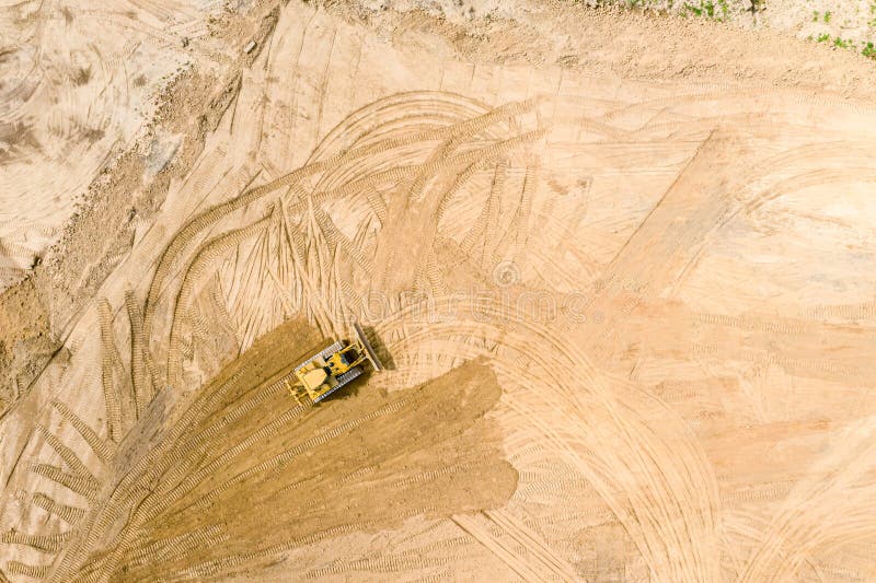 Aerial View of Yellow Industrial Bulldozer Working at Construction Site ...